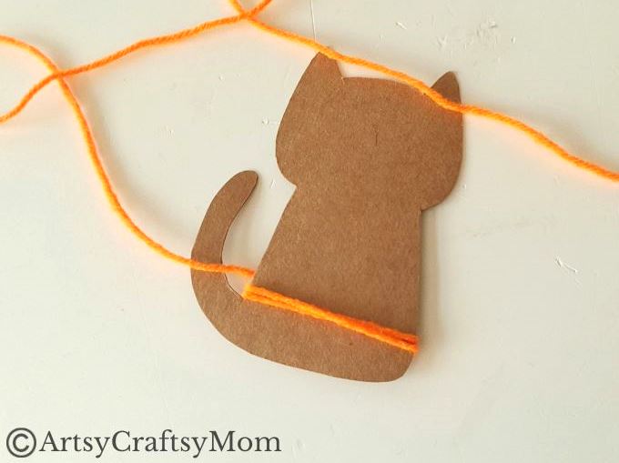 Colorful Yarn-Wrapped Cat Craft for Kids